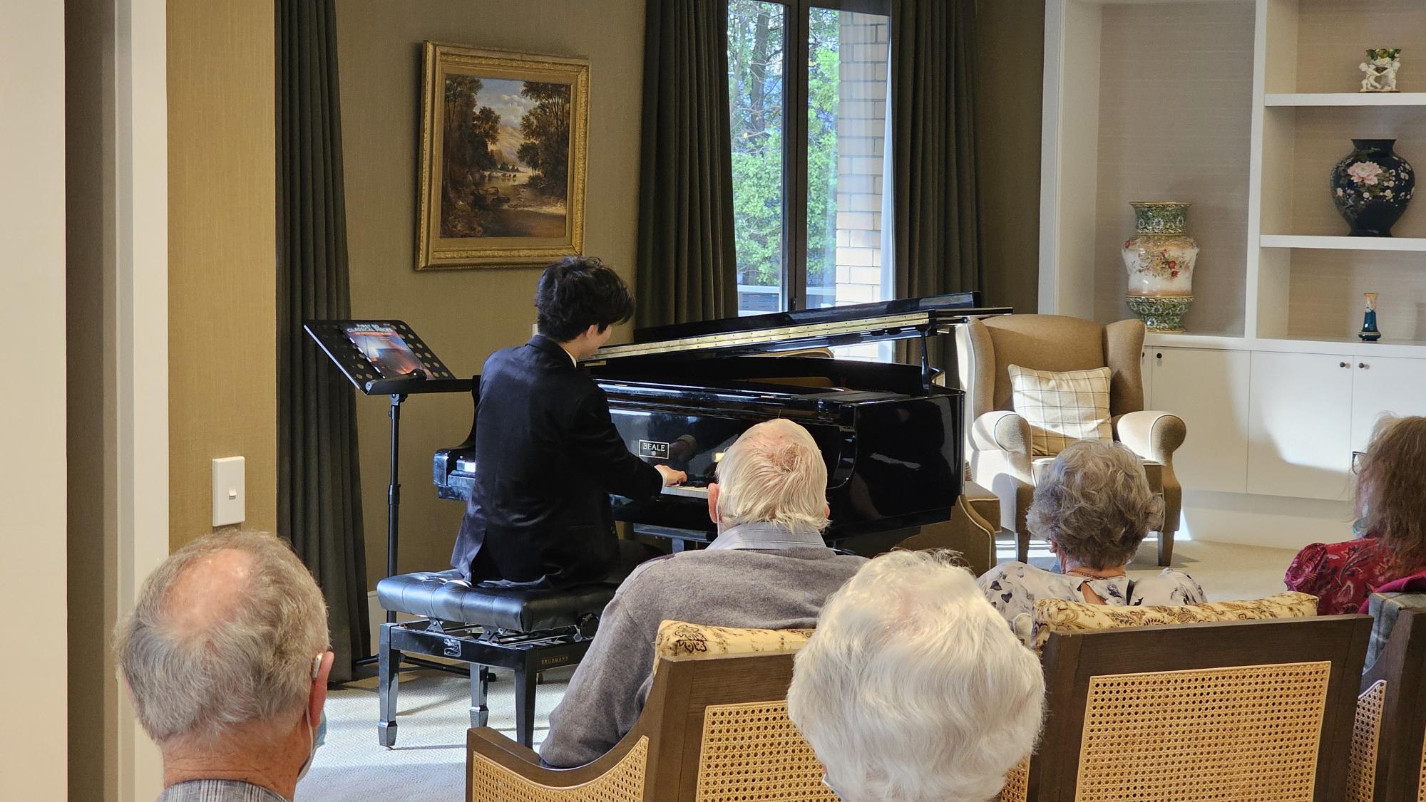 Striking a chord: Pianist Lixin Zhang delights residents at fundraising ...